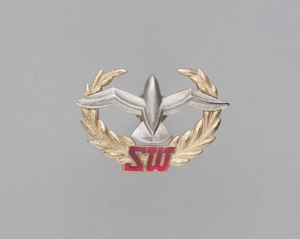 Objects | flight officer cap badge: Seaboard and Western Airlines | SFO ...